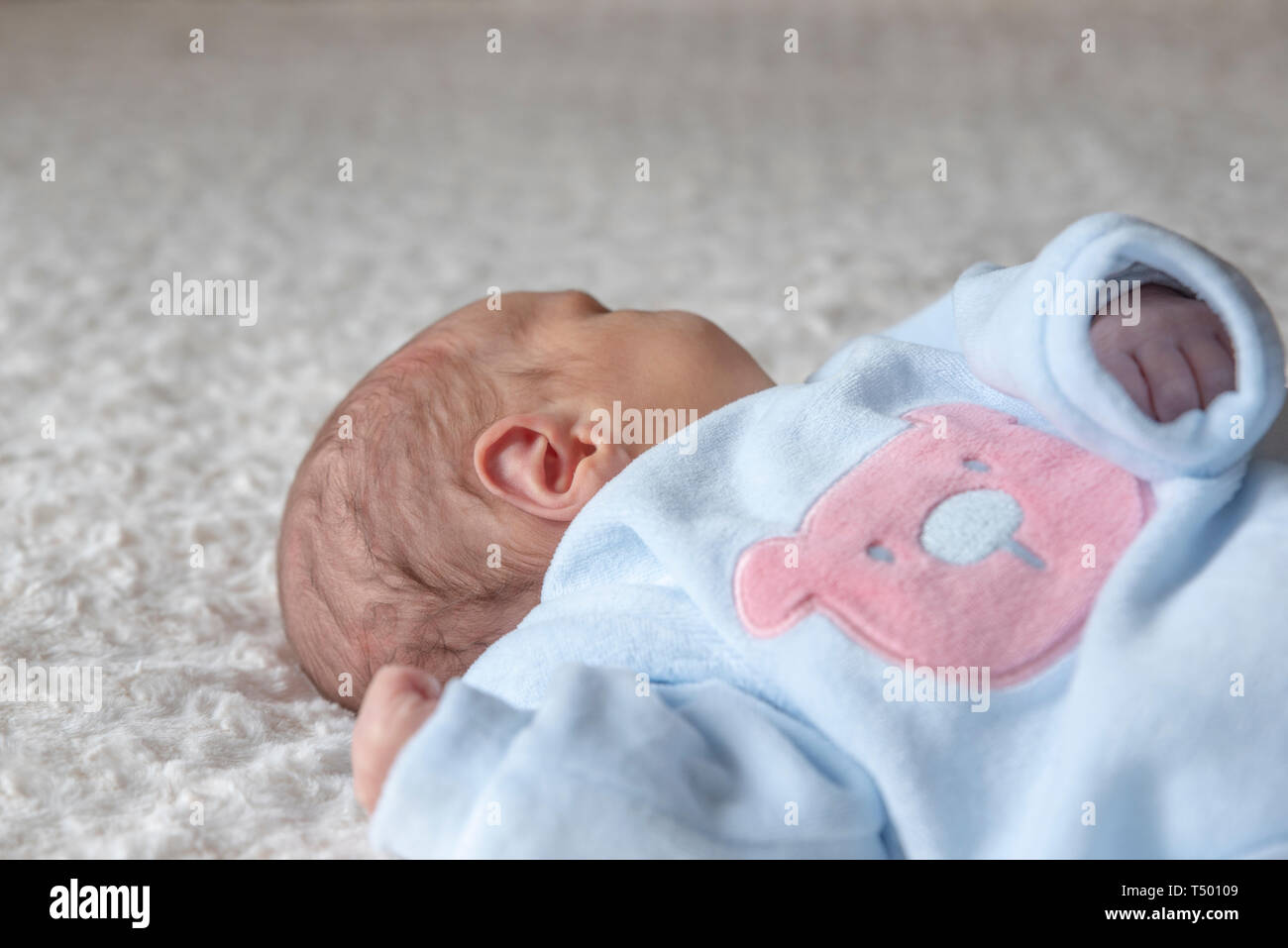 Baby girl infant ear hi-res stock photography and images - Alamy