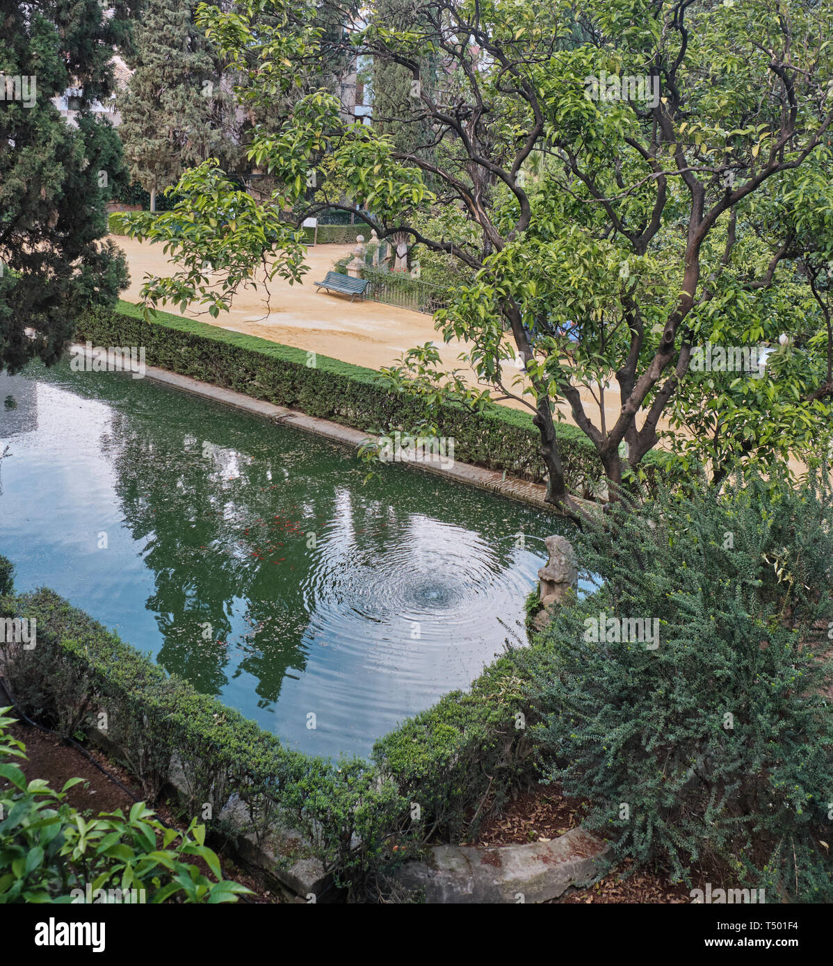 April 2019 - Seville Spain - fountain and gardens of Royal Alcazar ...