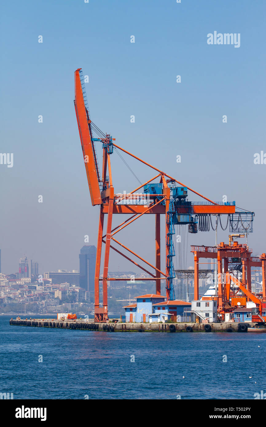 Orange Port Crane in a sea port Stock Photo - Alamy