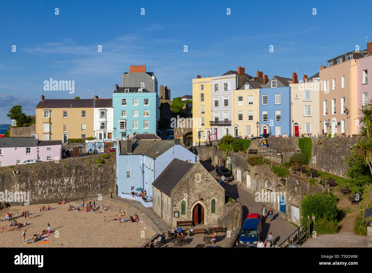 The colourful houses overlooking the pretty harbour in Tenby, Dyfed ...