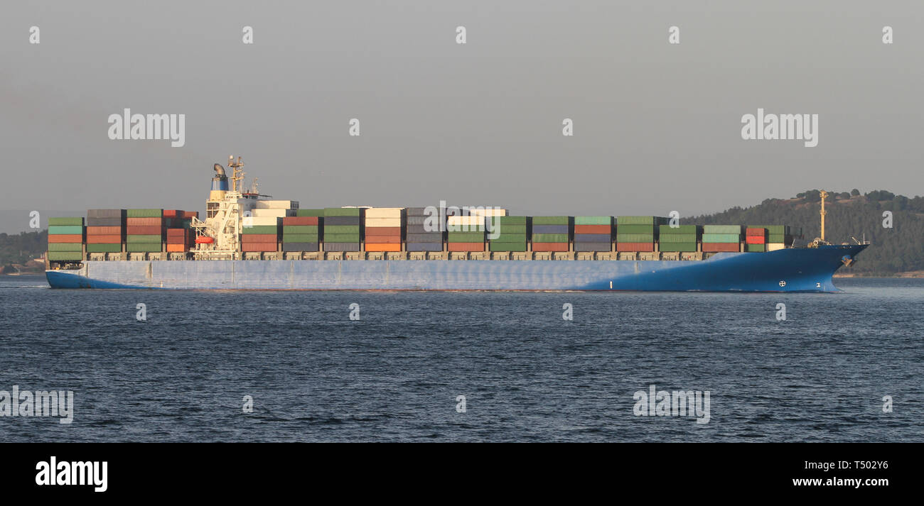 A container ship carrying goods between ports Stock Photo - Alamy