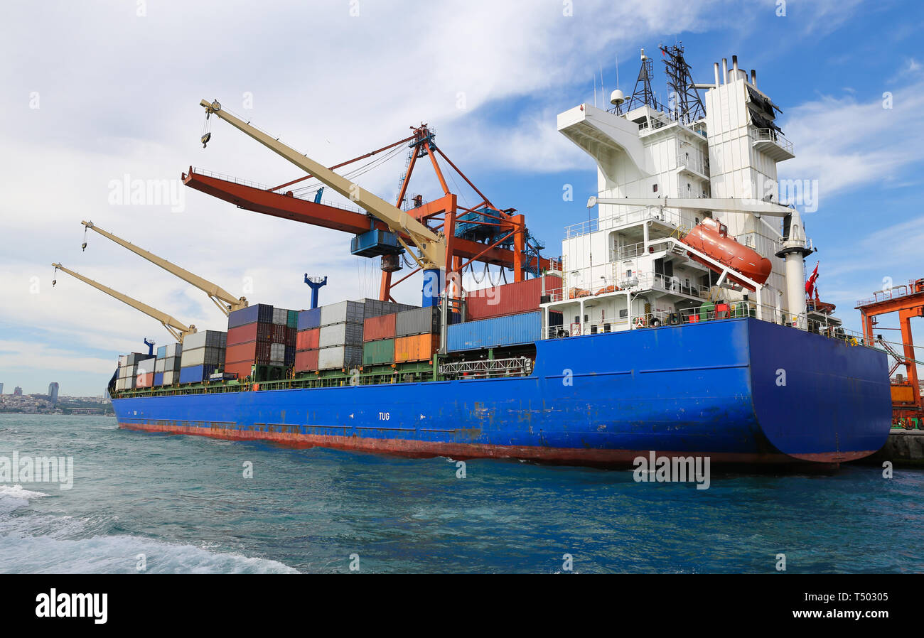 Container Ship is loading in a port Stock Photo - Alamy