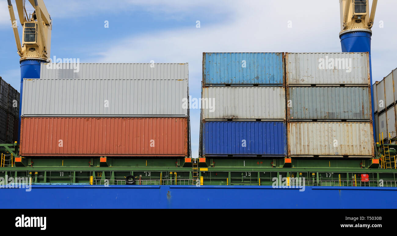 Container Ship is loading in a port Stock Photo - Alamy