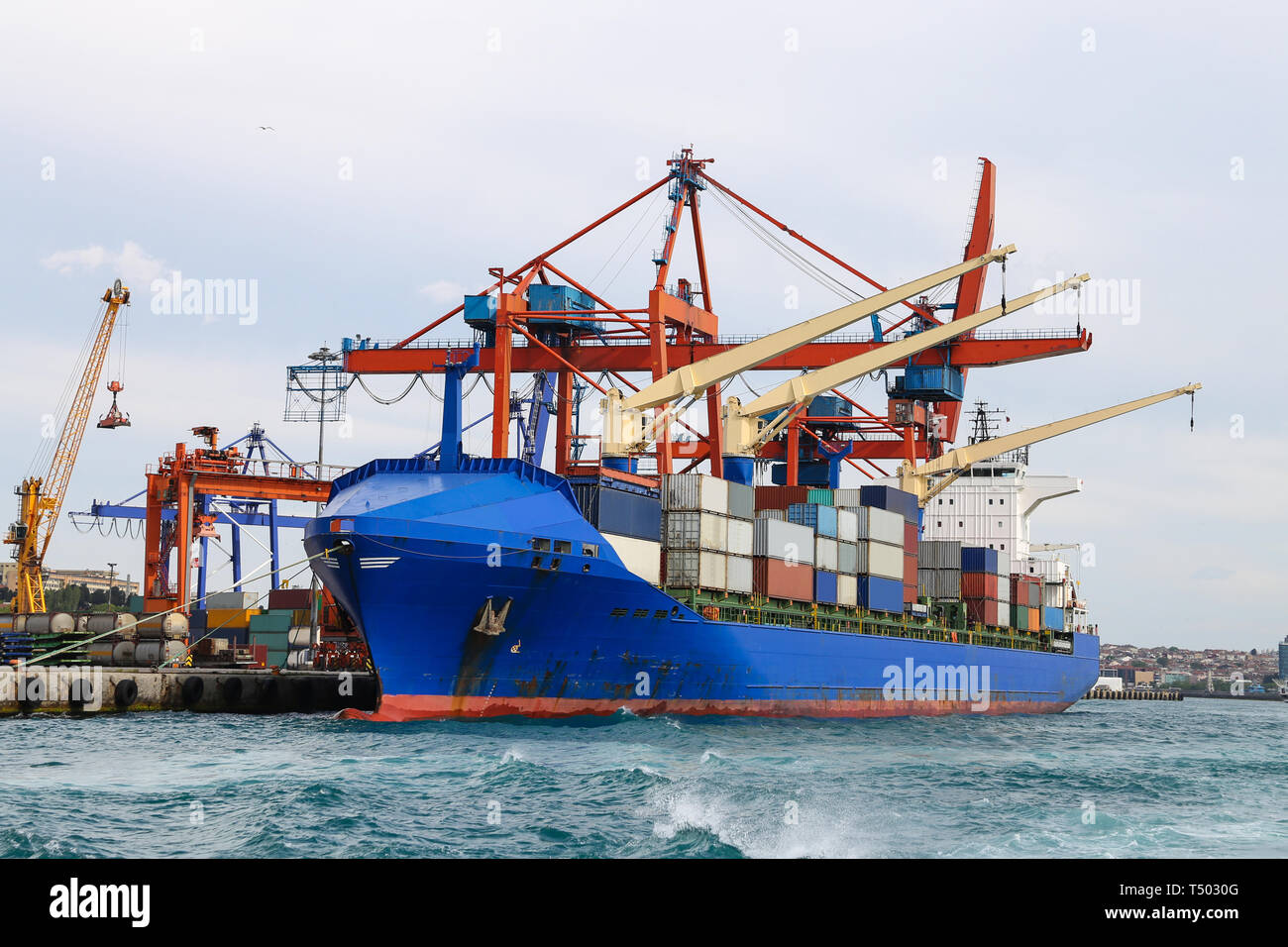 Container Ship is loading in a port Stock Photo - Alamy