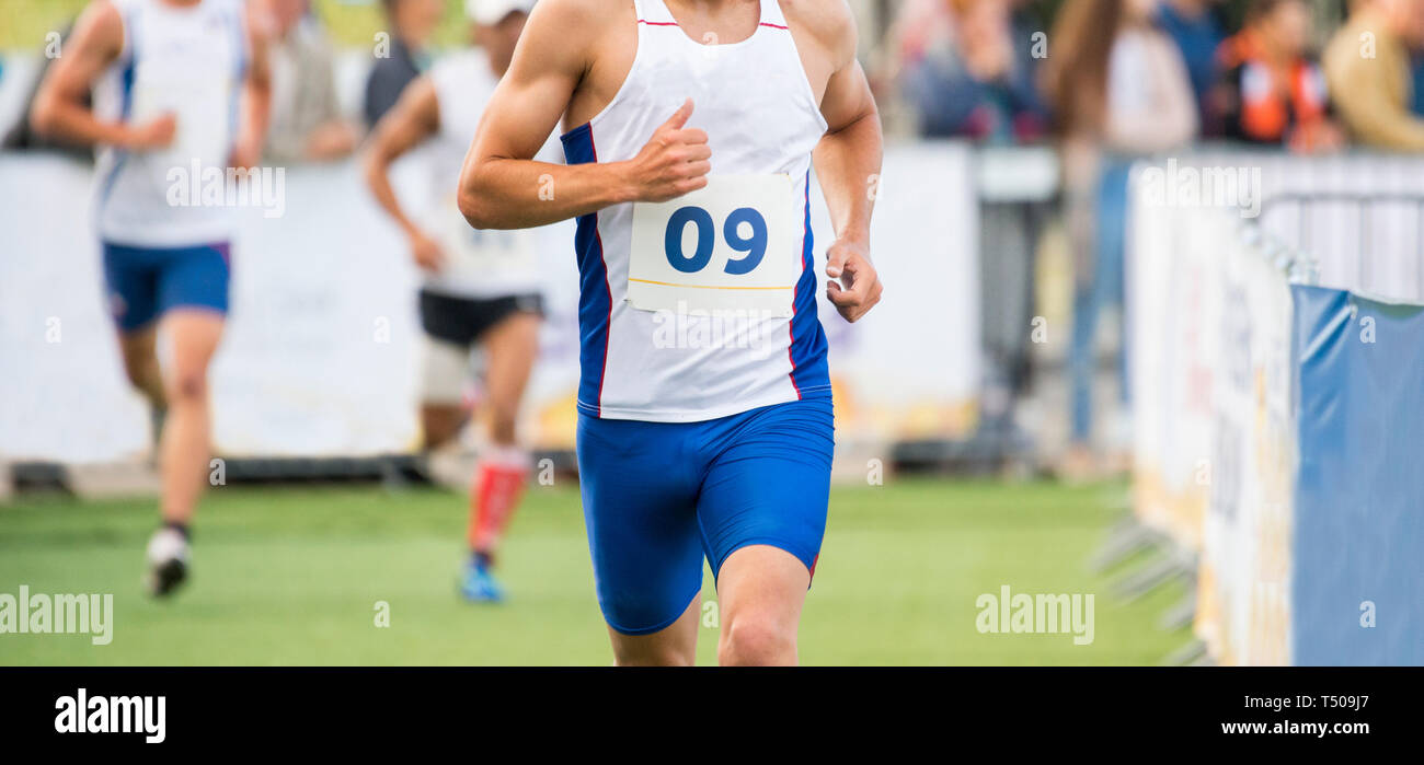 Group of unrecognizable runners outdoors. Long distance running Stock ...