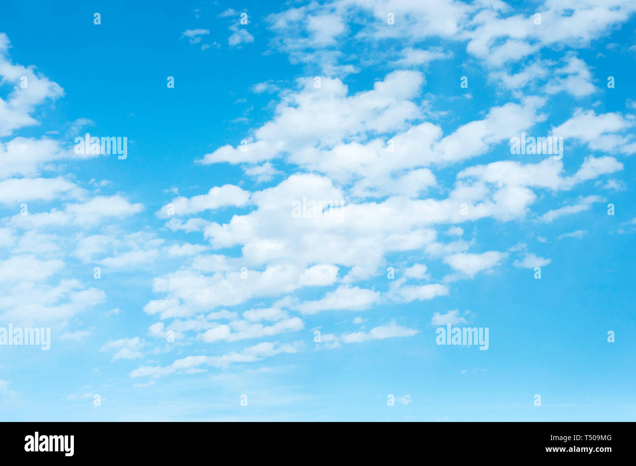 Blue sky background with clouds. Sky in April month Stock Photo - Alamy
