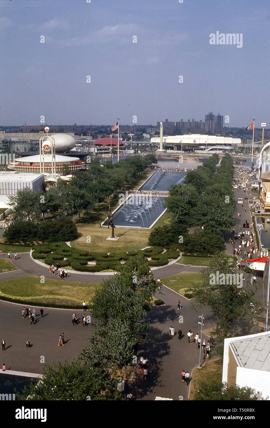 Bird's-eye view, on a sunny day, of people walking on the pavement ...