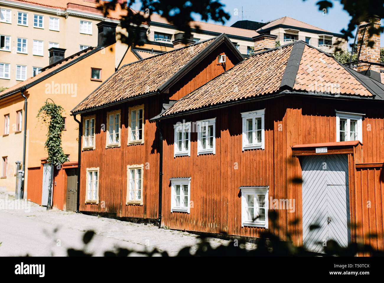 A row of buildings with traditional Swedish architecture at a ...