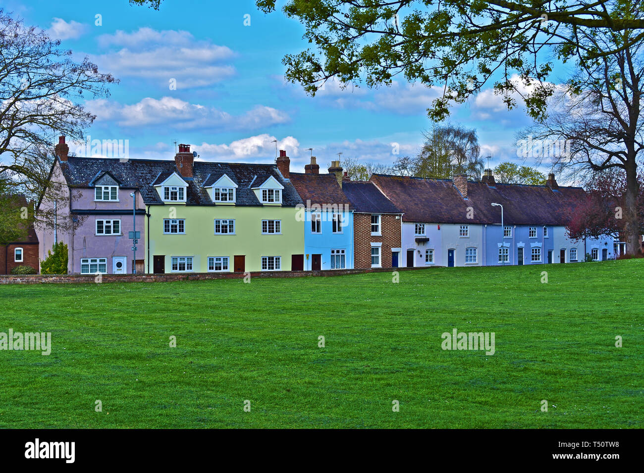 Pretty row of pastel coloured houses in Church Row overlooking the ...