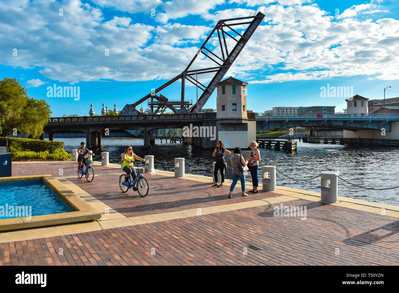 Tampa Bay, Florida. March 02, 2019 . Drawbridge and people biking at ...