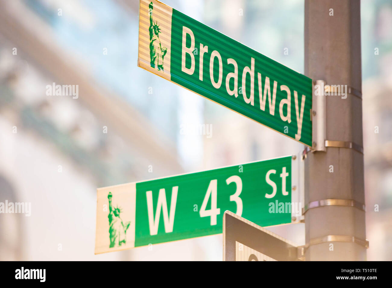New York City green street signs midtown at day Stock Photo - Alamy