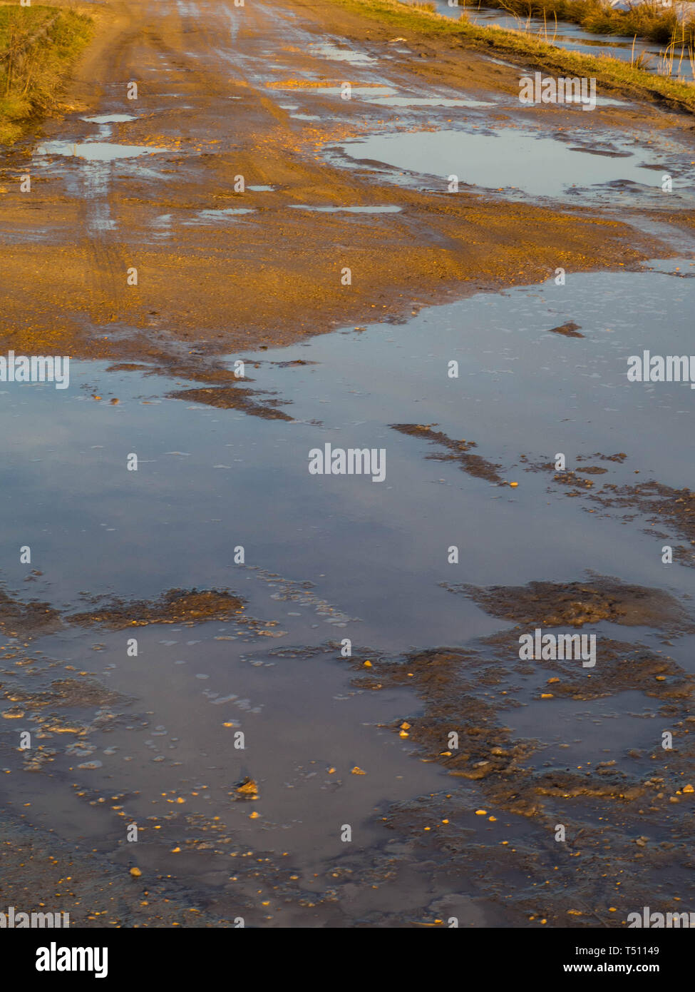 dirty rural road with deep tire tracks, bad road concept Stock Photo ...