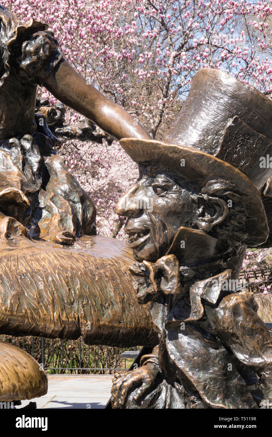 Alice in Wonderland Sculpture is framed by spring trees, Central Park ...