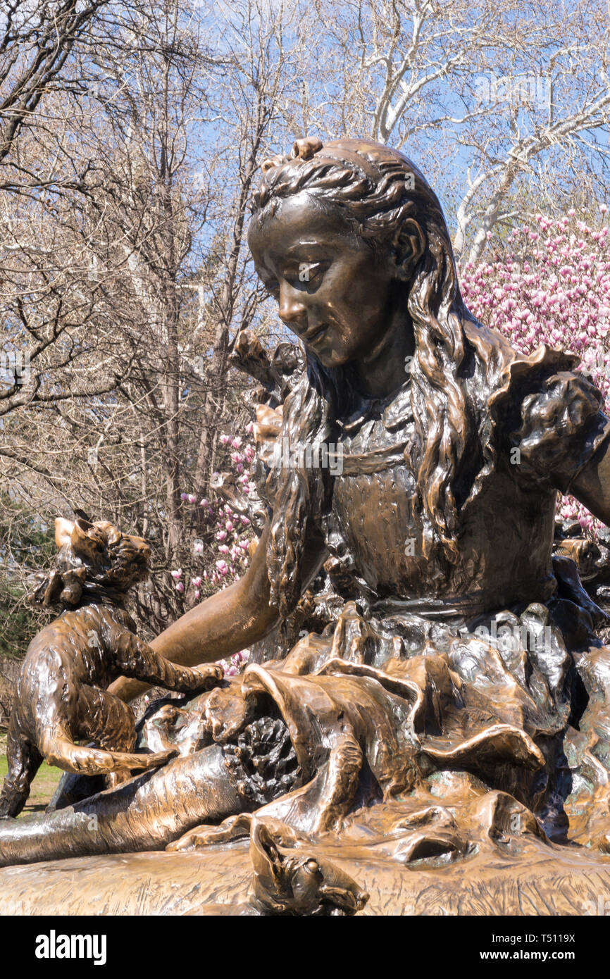 Alice in Wonderland Sculpture is framed by spring trees, Central Park ...