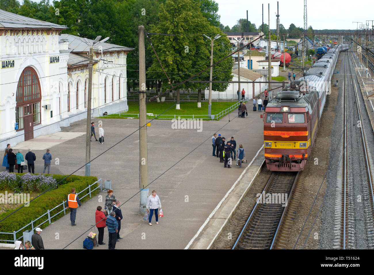SHARYA, RUSSIA - SEPTEMBER 04, 2017: Passenger train with electric ...