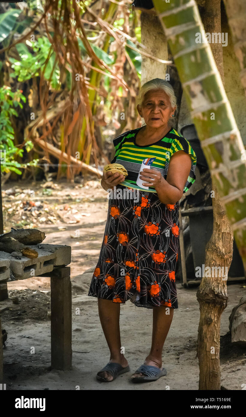 Poverty woman face latin america hi-res stock photography and images ...
