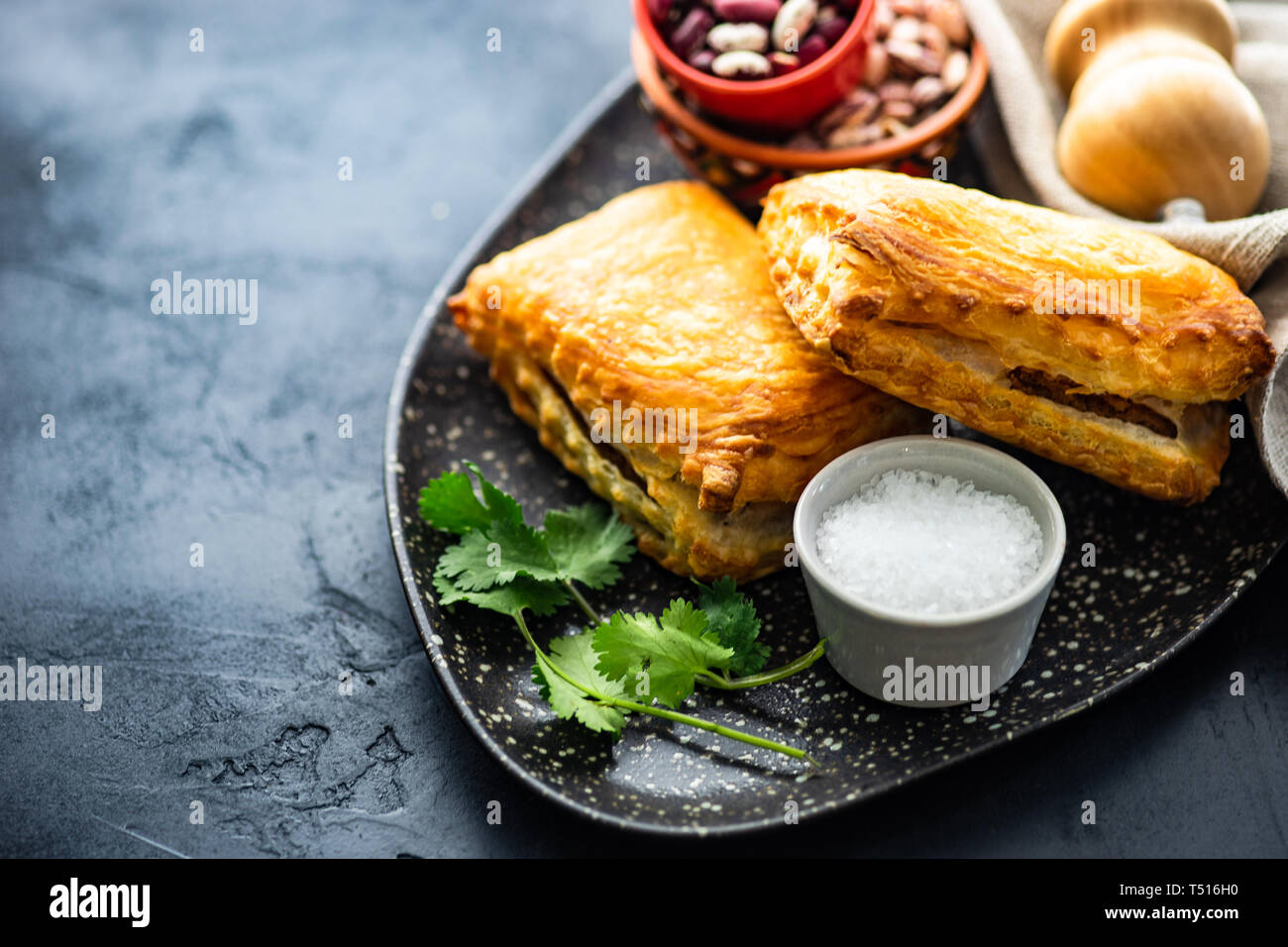 Traditional georgian lobiani pie with beans and herbs on rustic ...