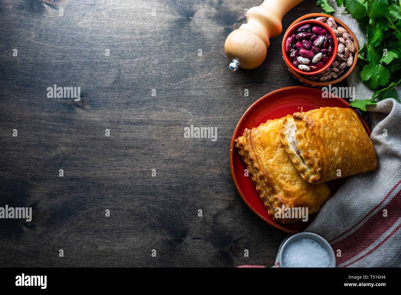Traditional georgian lobiani pie with beans and herbs on rustic ...