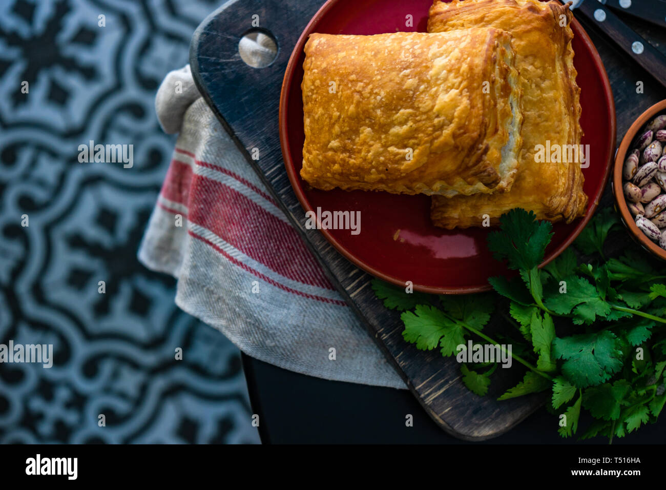 Traditional georgian lobiani pie with beans and herbs on rustic ...