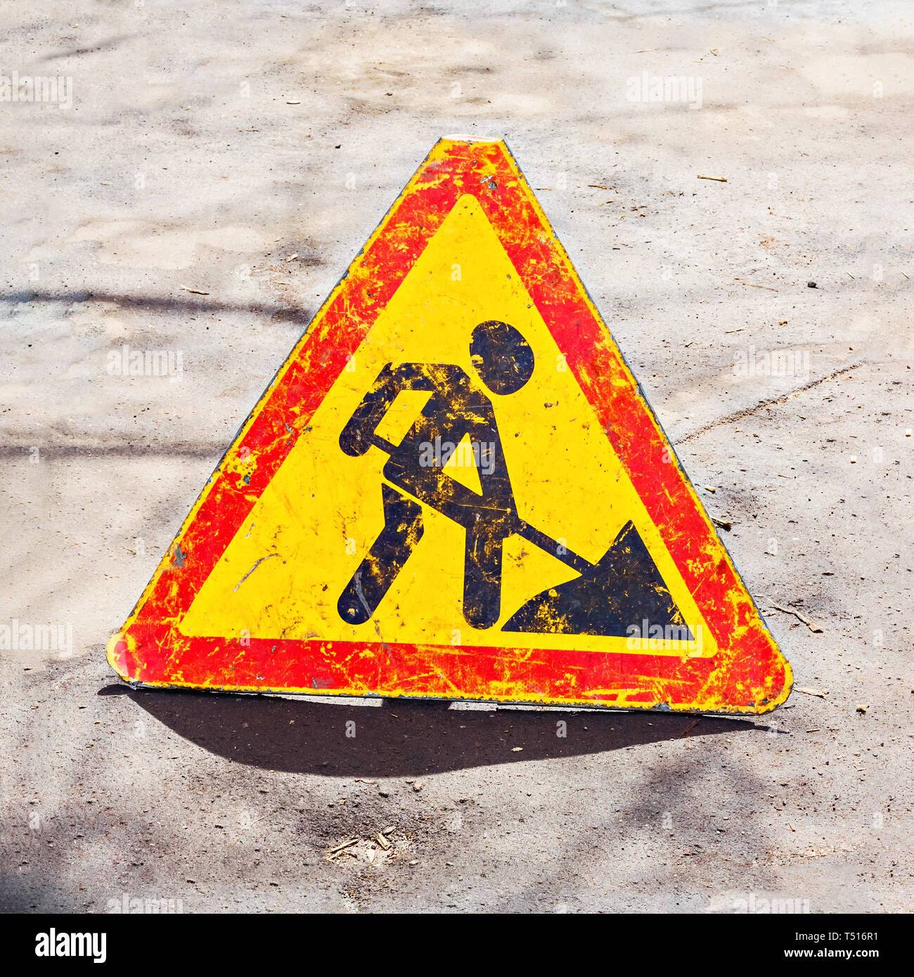 Works ahead warning sign on a road. Square image Stock Photo - Alamy