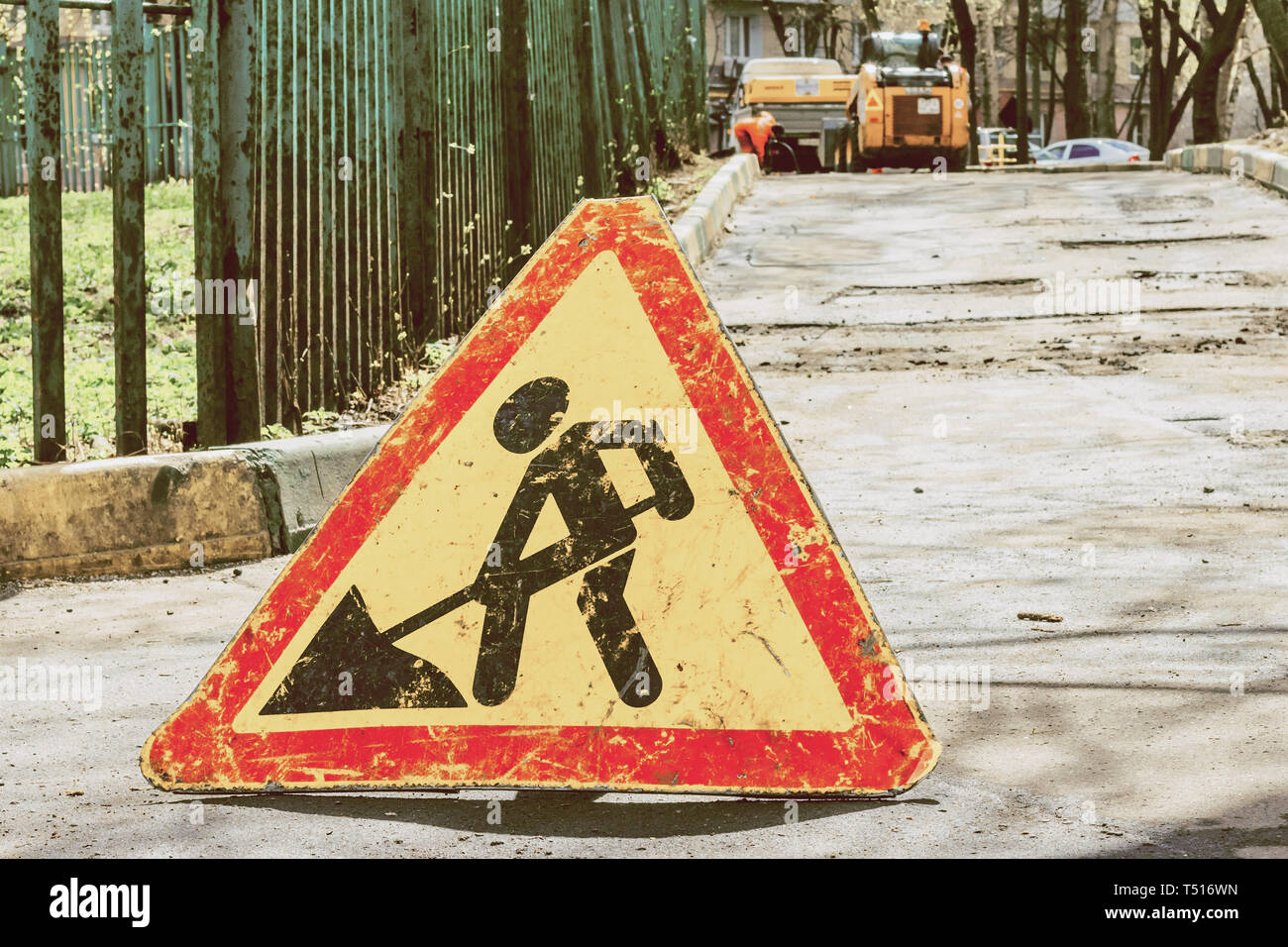 A sign of a man with a shovel. Caution, road works are under way Stock ...