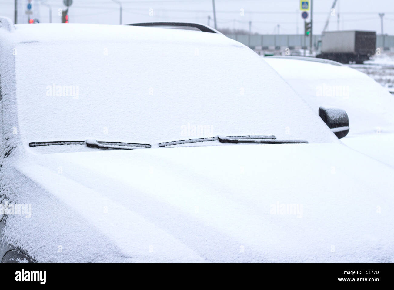 A car in the snow. Frozen windshield Stock Photo - Alamy