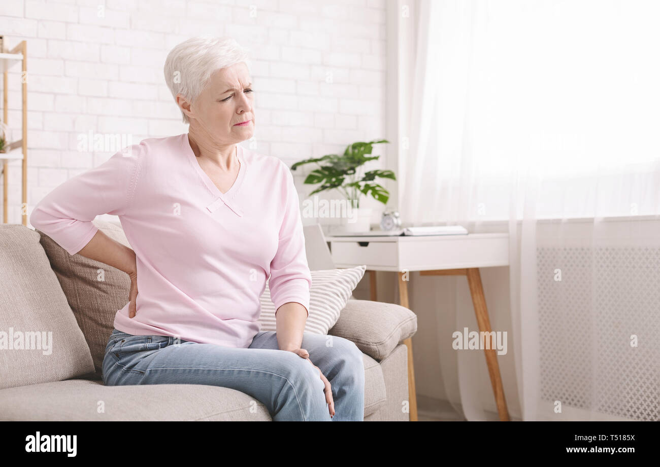 Woman Backache Mature High Resolution Stock Photography and Images - Alamy