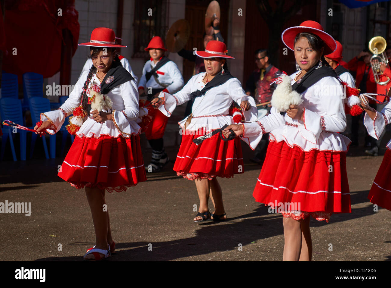 Llamerada dancers in ornate costumes performing as they parade through ...