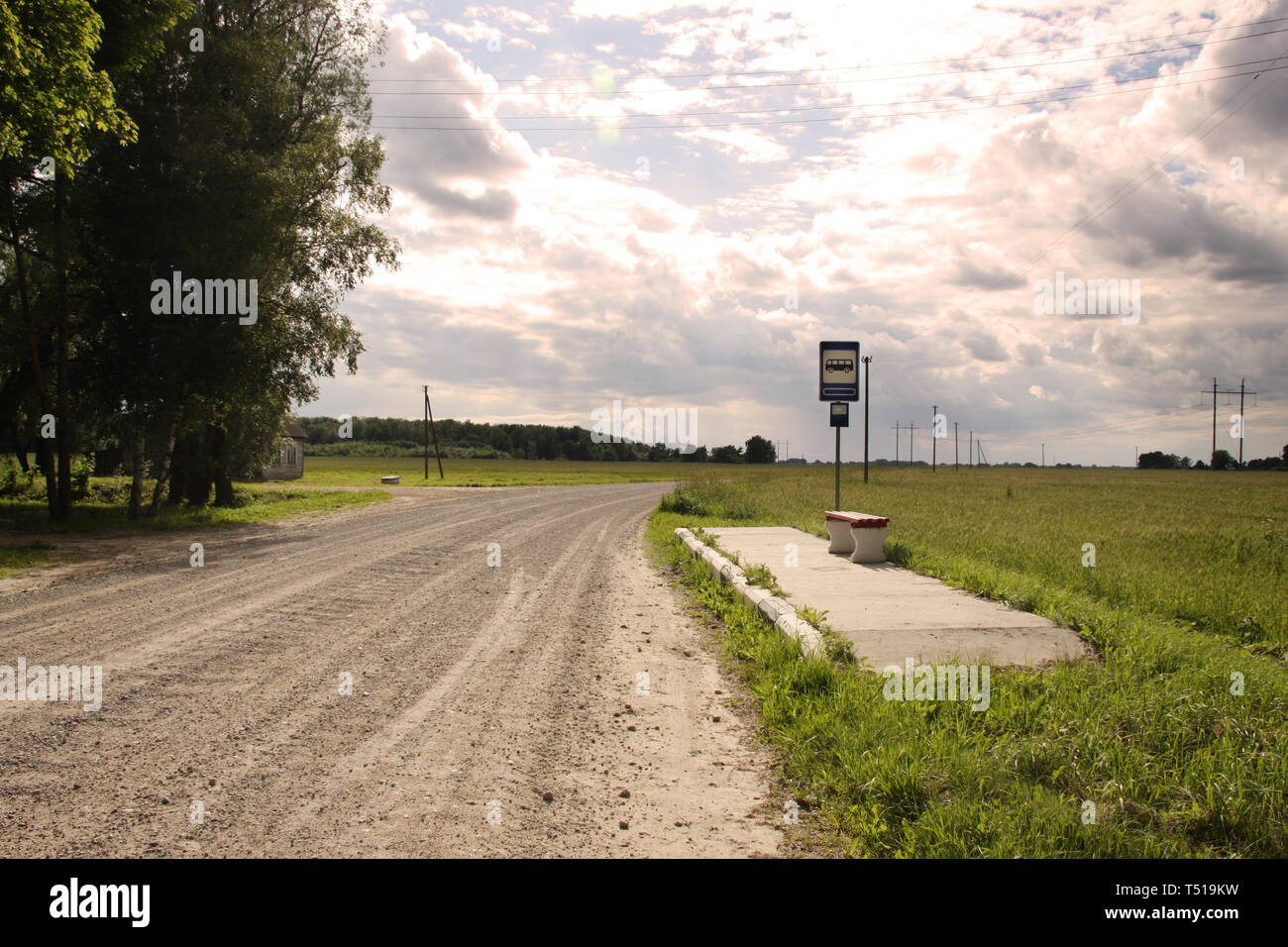 Bus stop in Lithuania village gravel road Stock Photo - Alamy