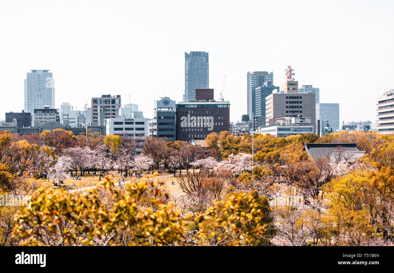 The view to modern Osaka buildings from the Osaka Castle Stock Photo ...