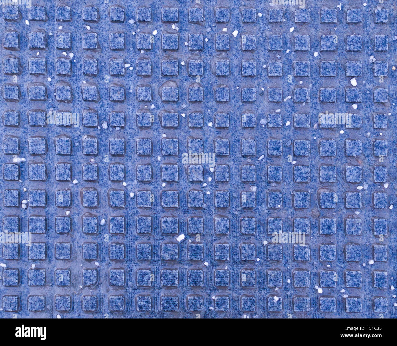 blue squared tile for blind pedestrians on the sidewalk. texture ...