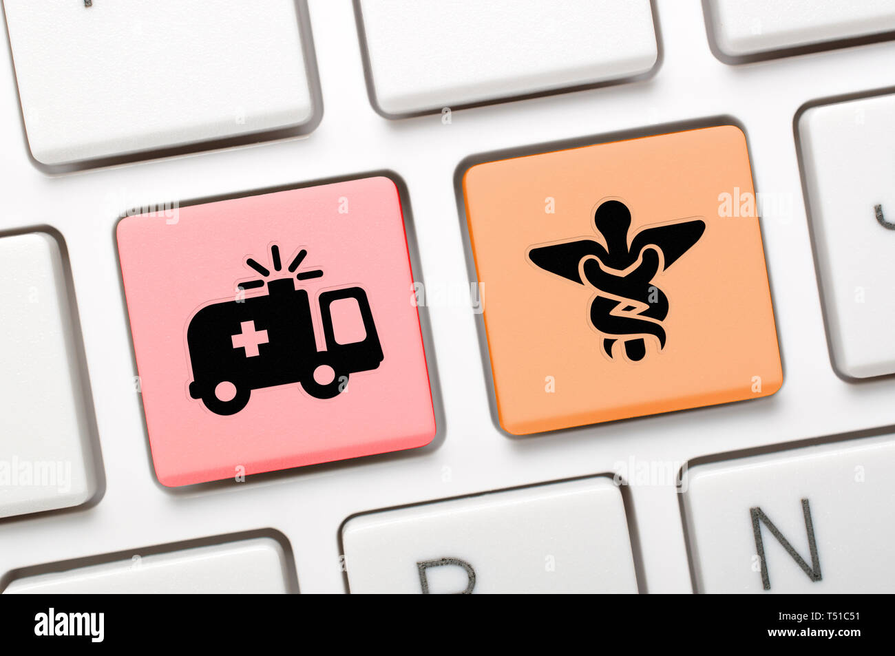 Colorful ambulance key on keyboard Stock Photo - Alamy