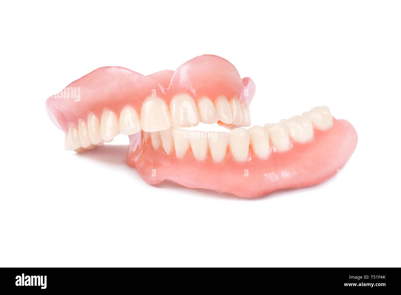 Medical denture on white background Stock Photo - Alamy