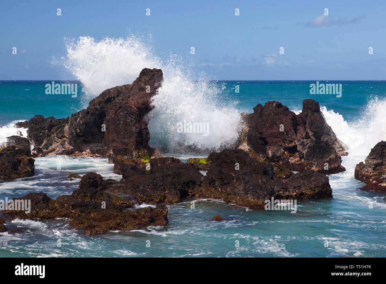 Waves splashing on the Hookipa rocks in northern Maui, Hawaii Stock ...