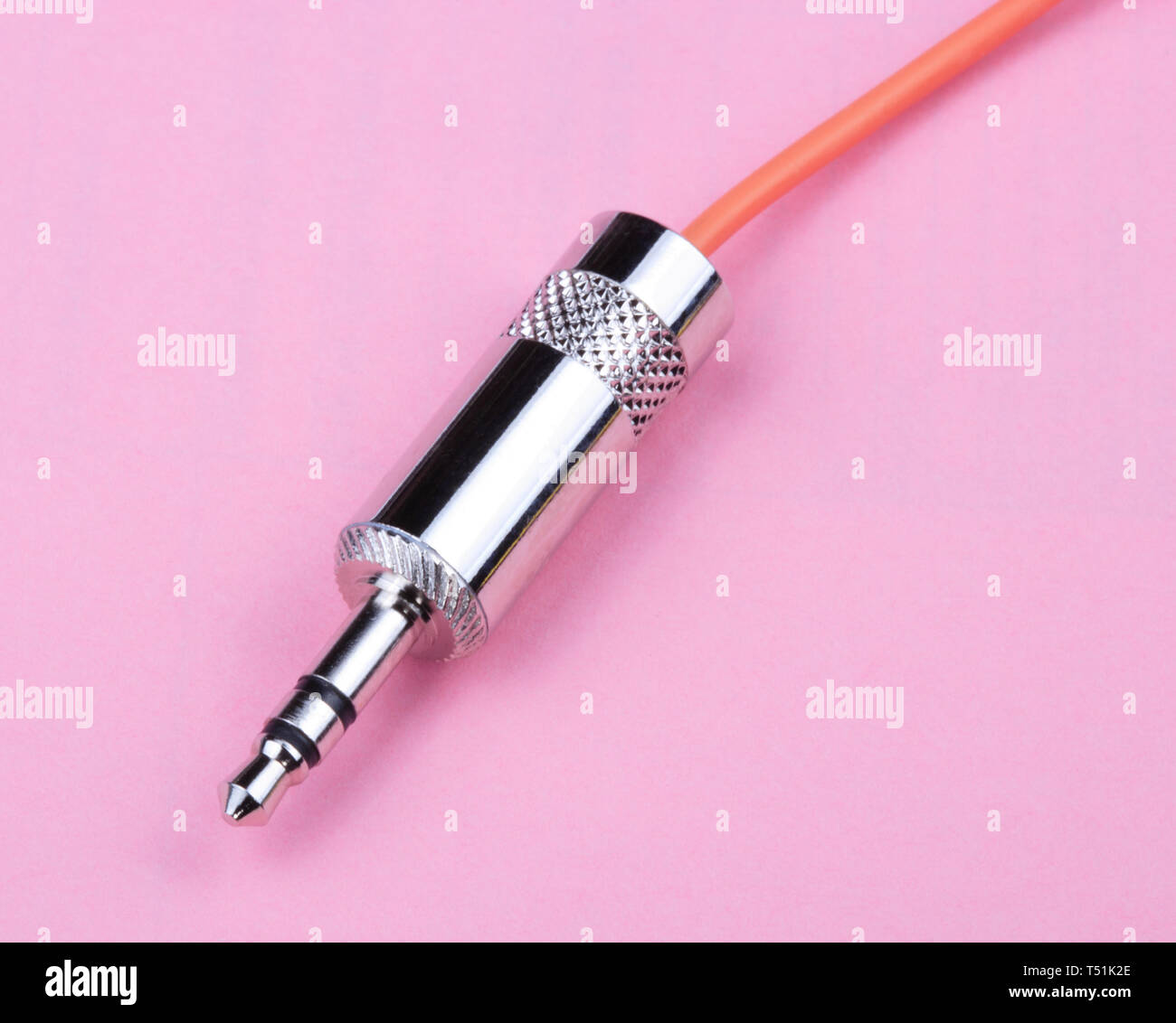Stereo Male Plug Connector on Pink Background Stock Photo - Alamy