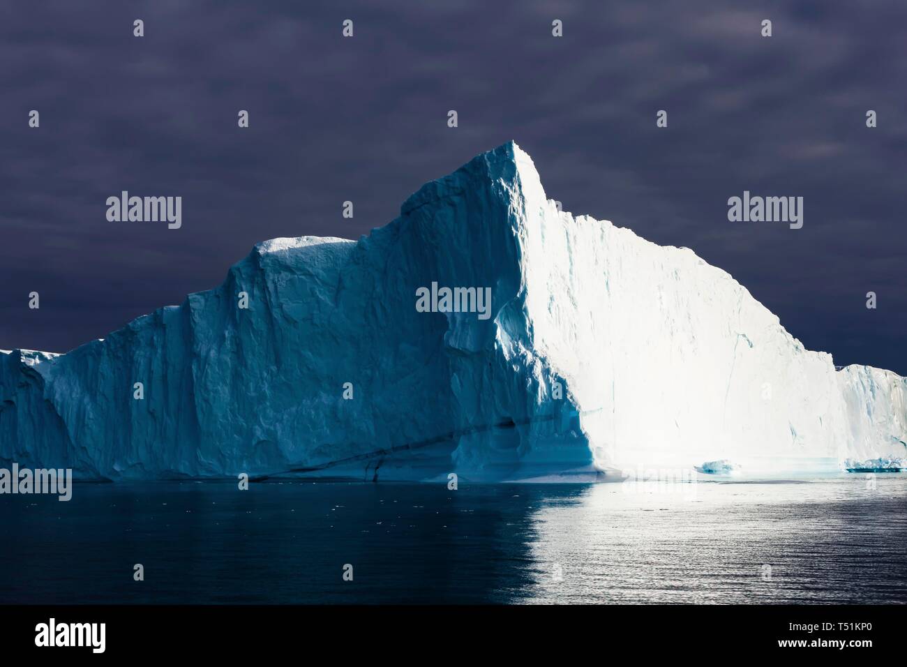 Iceberg under dark cloud sky hi-res stock photography and images - Alamy