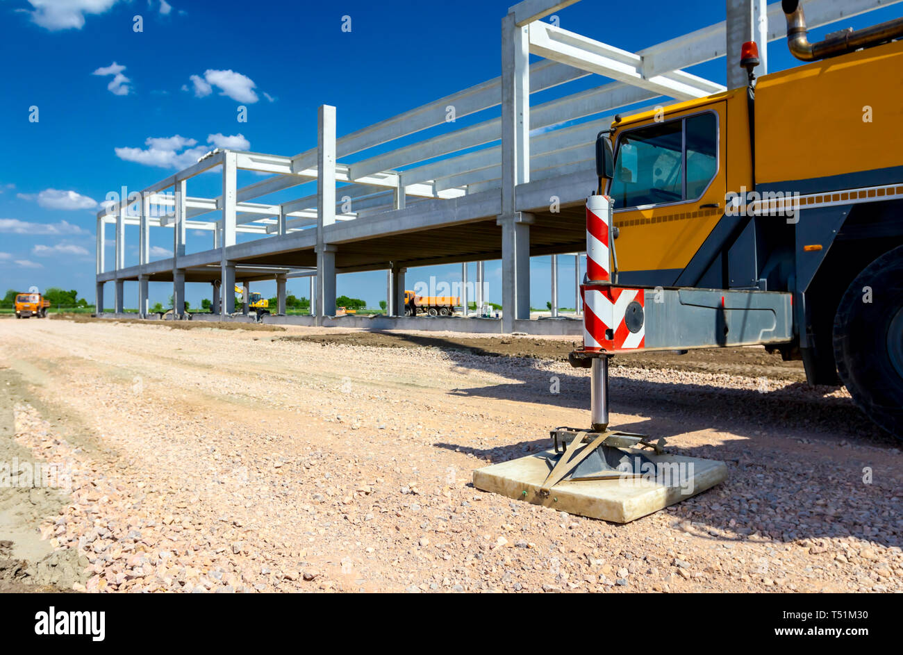 Extended side hydraulic outrigger to increase crane stability until is ...