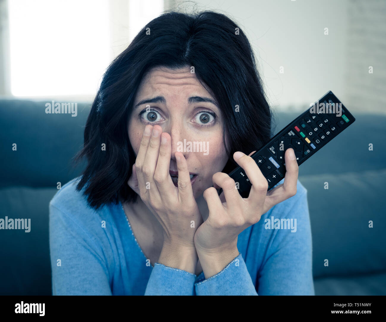 Lifestyle portrait of woman feeling scared and shocked making fear ...