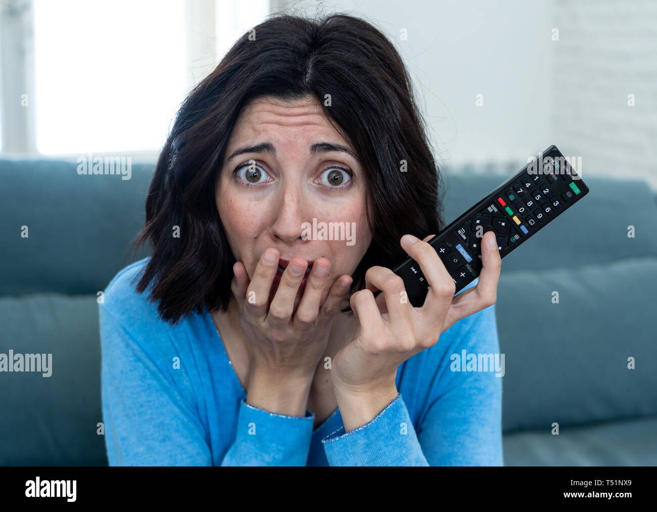 Lifestyle portrait of woman feeling scared and shocked making fear ...
