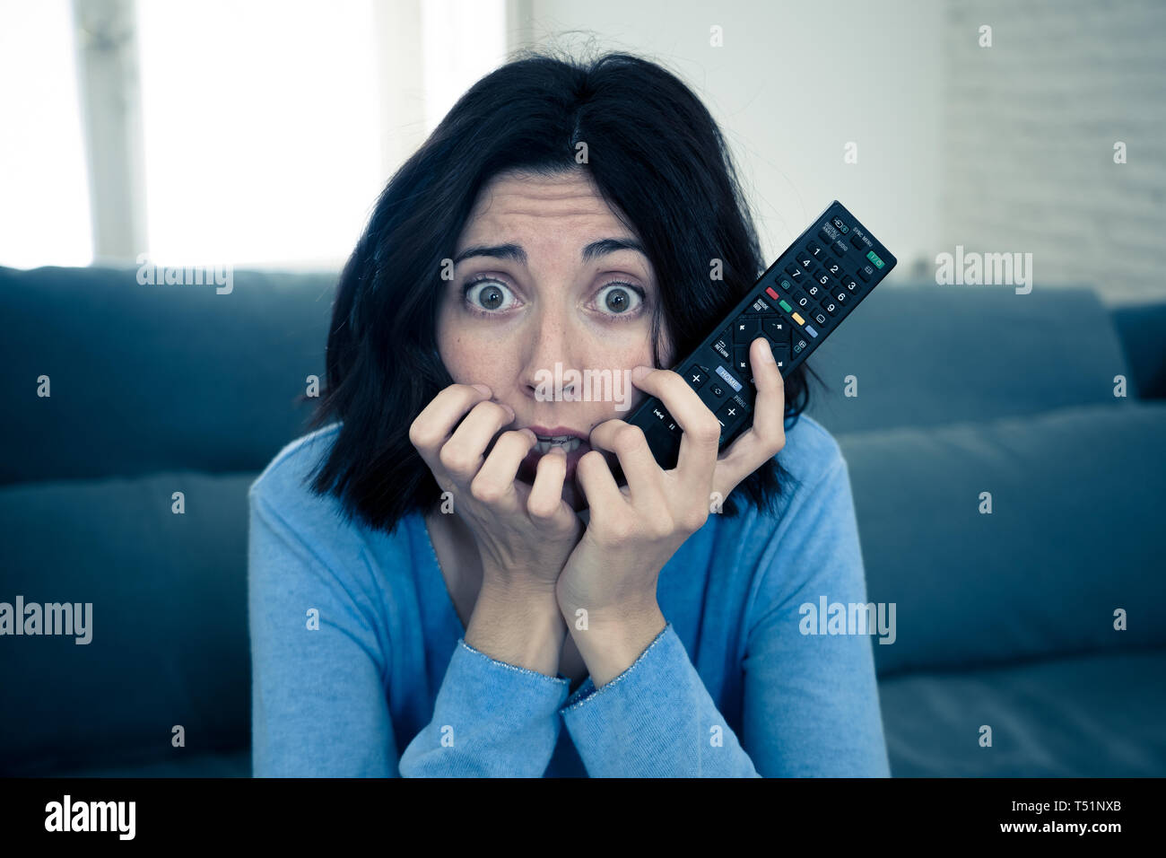 Lifestyle portrait of woman feeling scared and shocked making fear ...