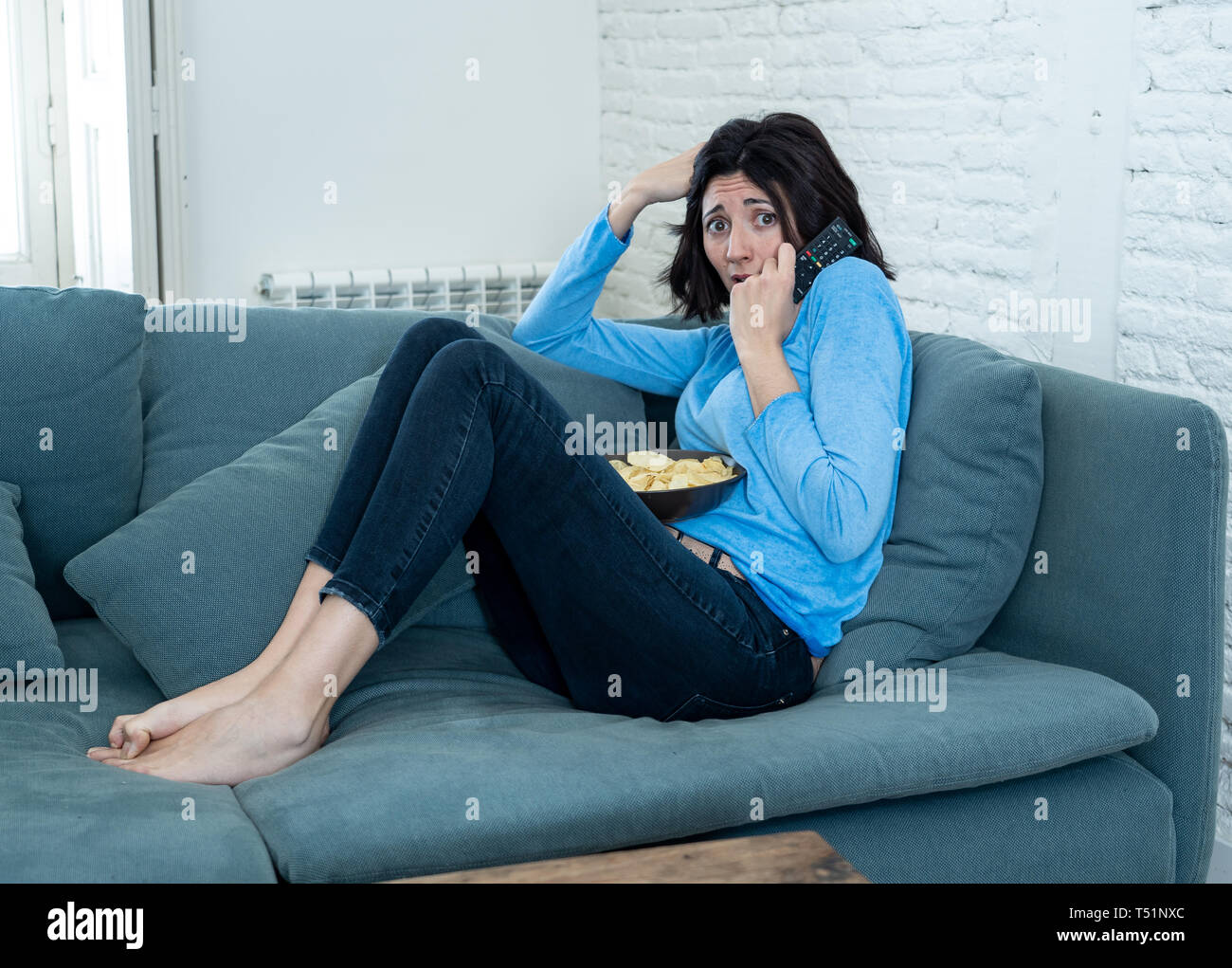 Lifestyle portrait of woman feeling scared and shocked making fear ...