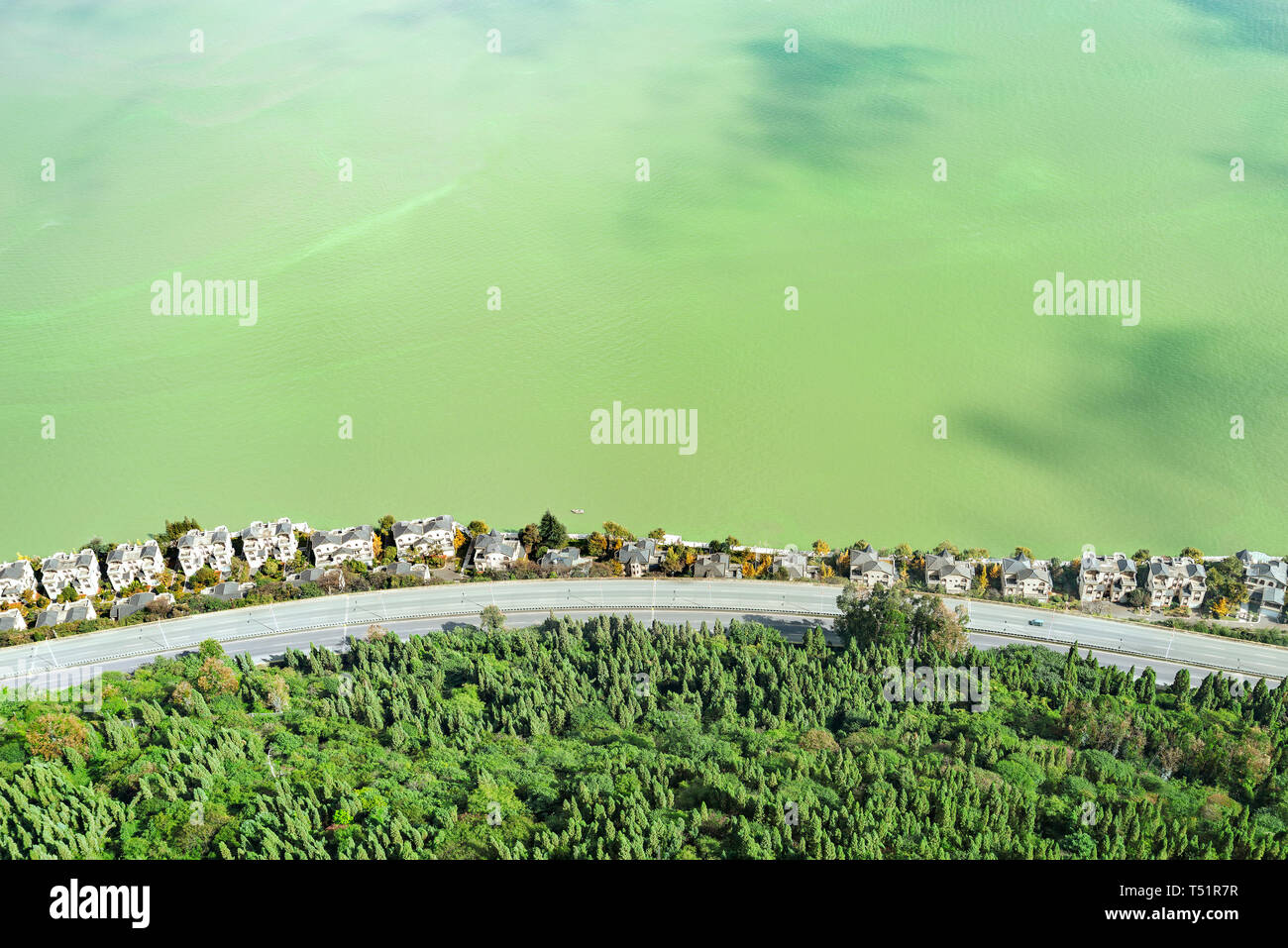Aerial view of the road and rich houses by Dianchi lake. Kunming. China ...