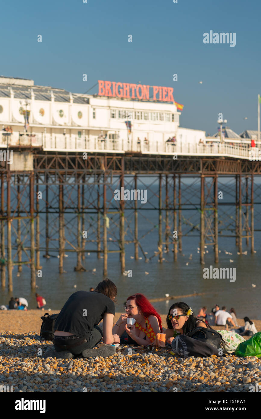 People enjoying the unusually warm spring weather on Brighton beach on ...