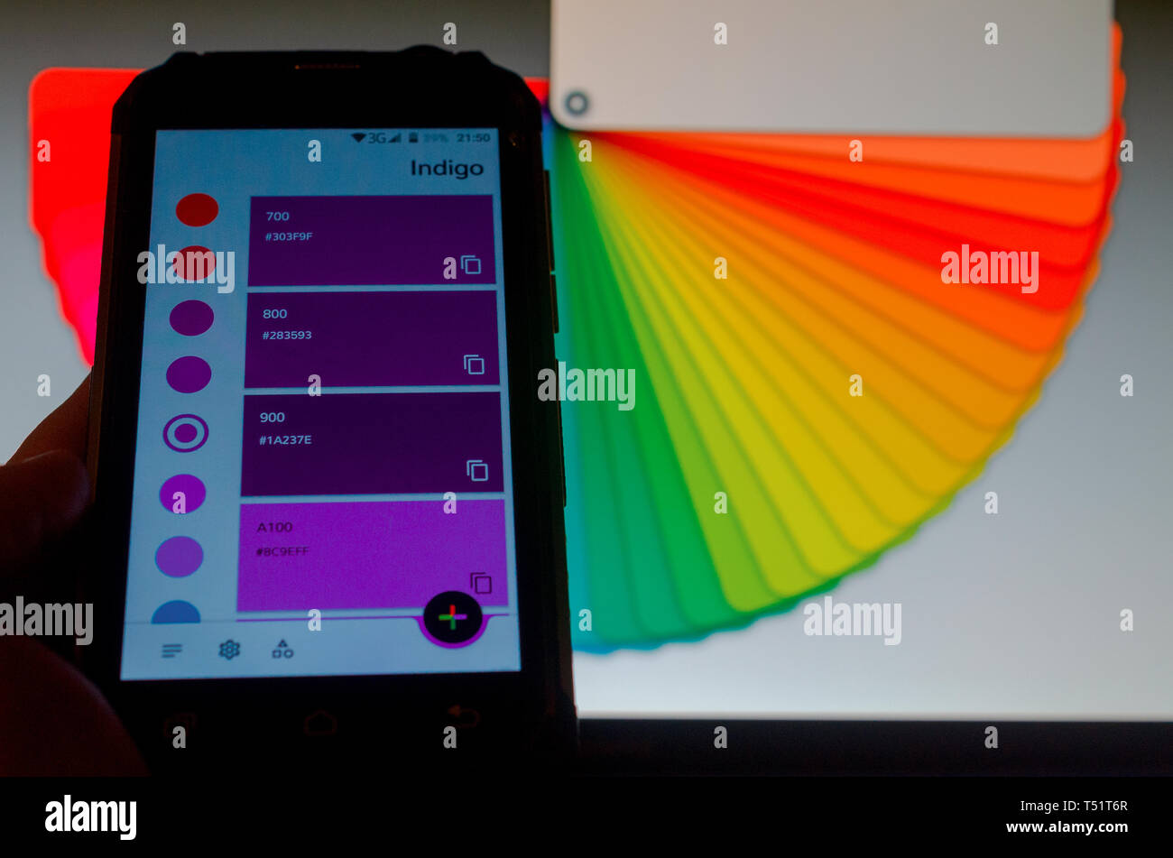 Electronic color palettes between a smartphone and a laptop Stock Photo ...