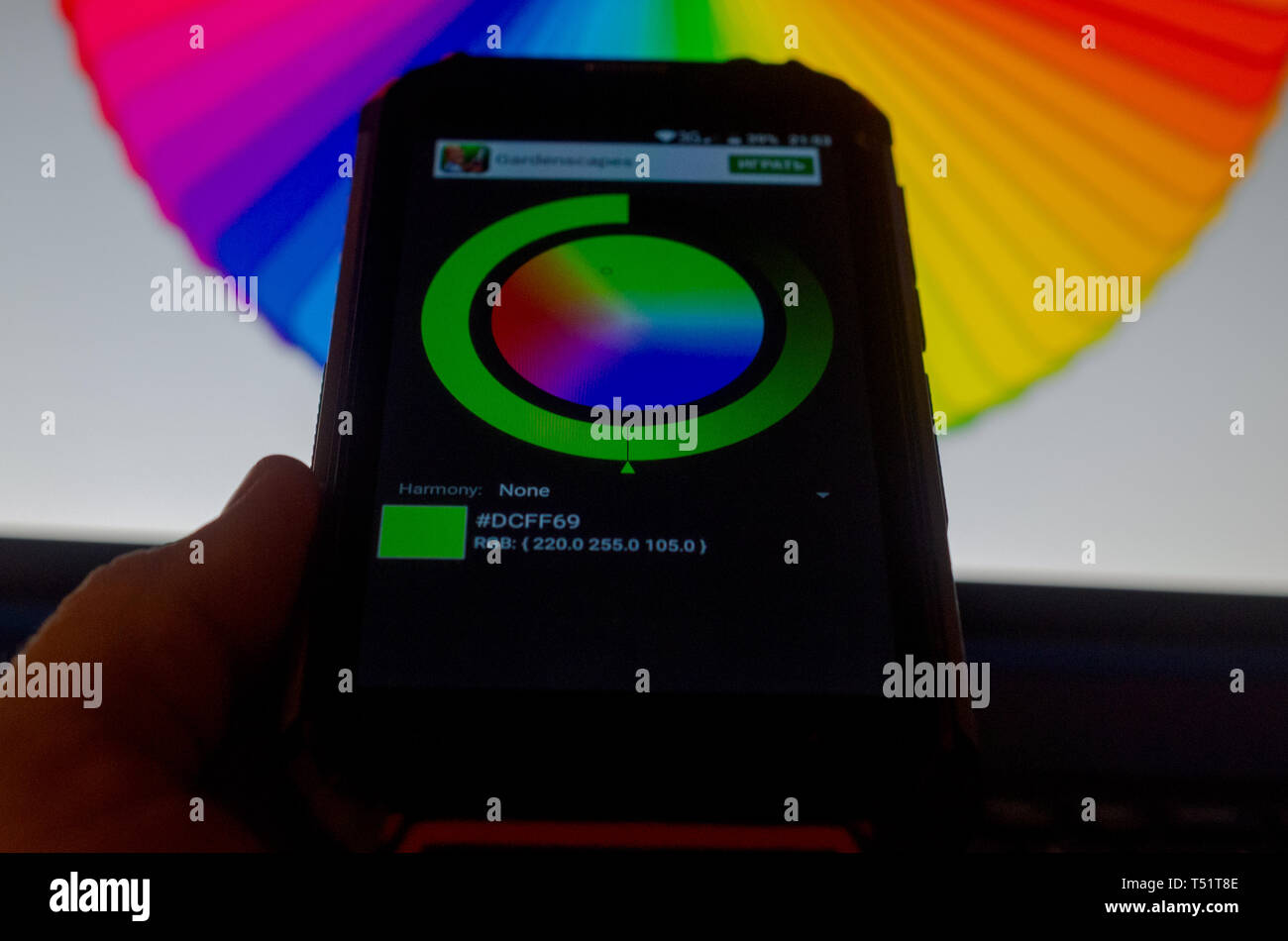 Electronic color palettes between a smartphone and a laptop Stock Photo ...