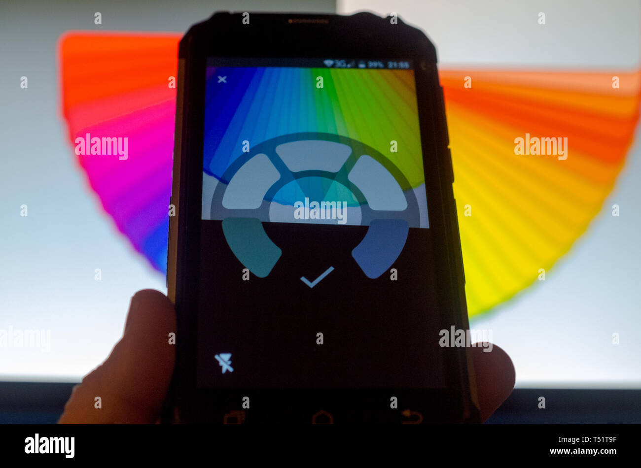 Electronic color palettes between a smartphone and a laptop Stock Photo ...