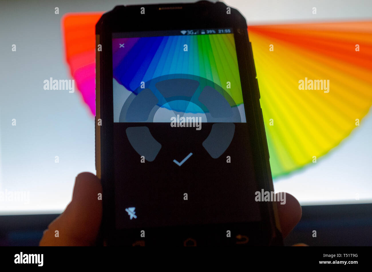 Electronic color palettes between a smartphone and a laptop Stock Photo ...