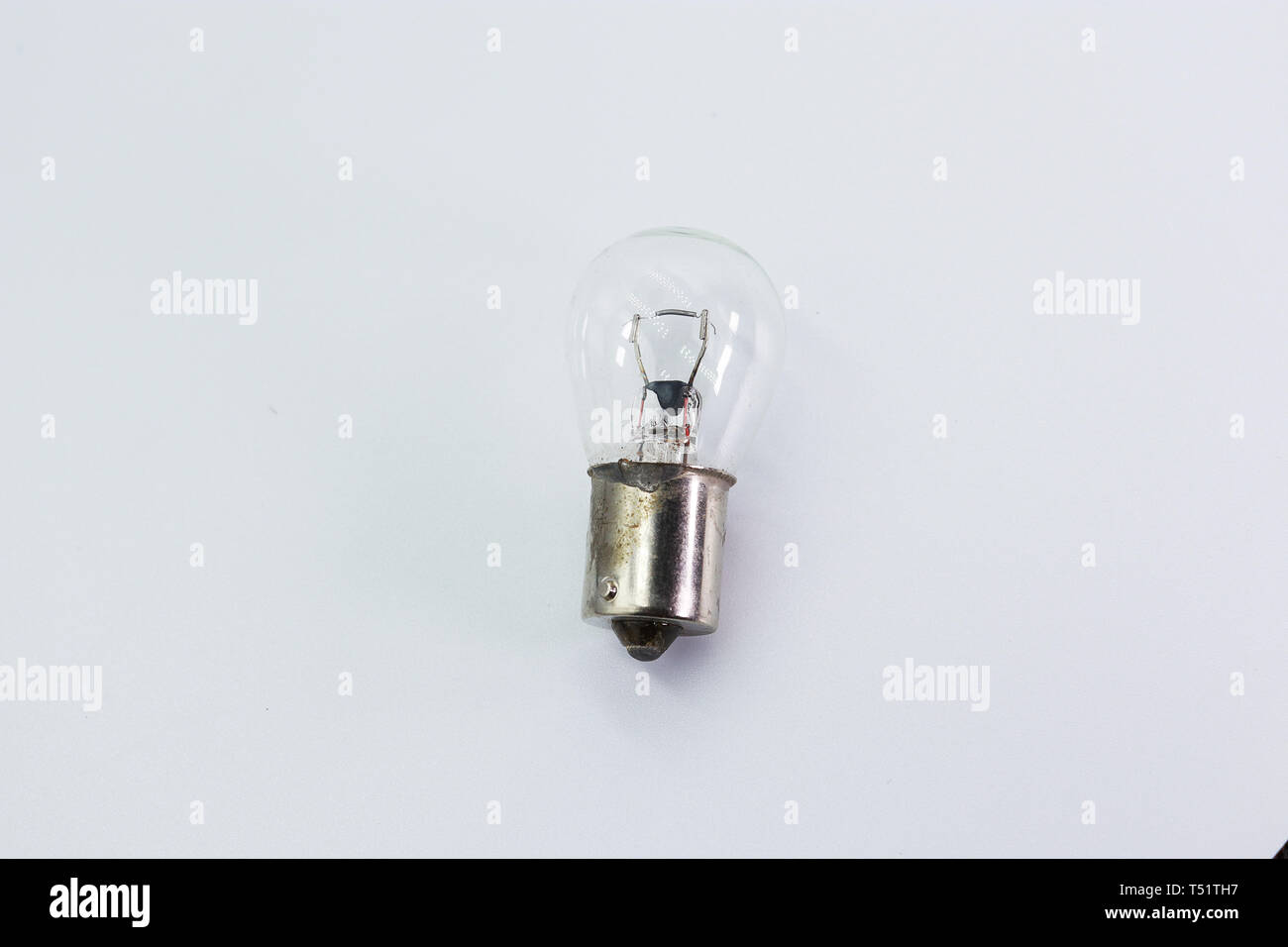a small light bulb isolated on white background. High resolution image ...