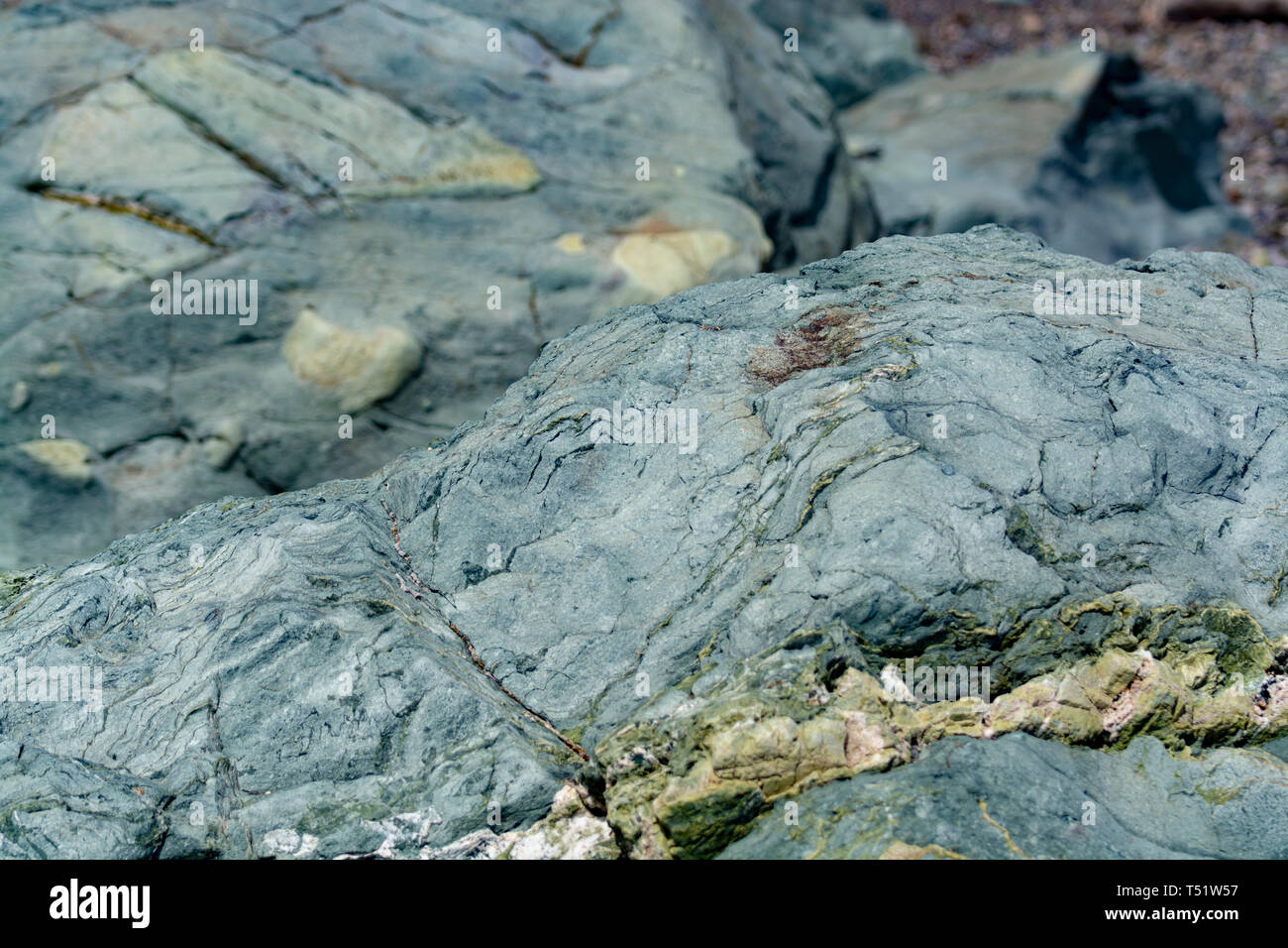 Background with green mineral rock close up, gemstone texture, olivine ...