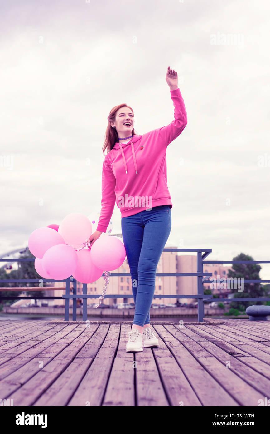 Active laughing girl spending great time on the fresh air Stock Photo ...